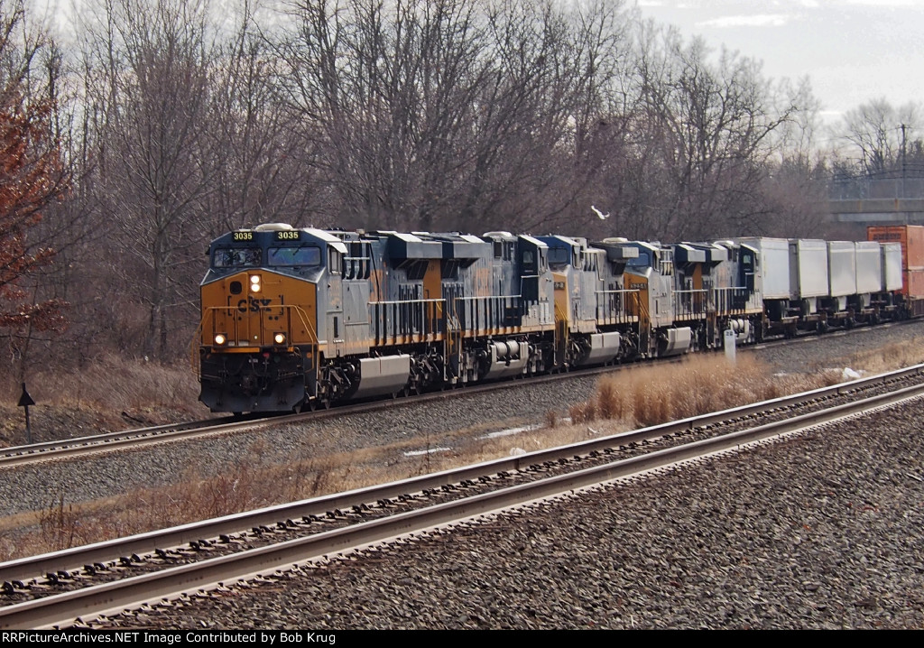 CSX 3035 leads a westbound intermodal through Guilderland Center